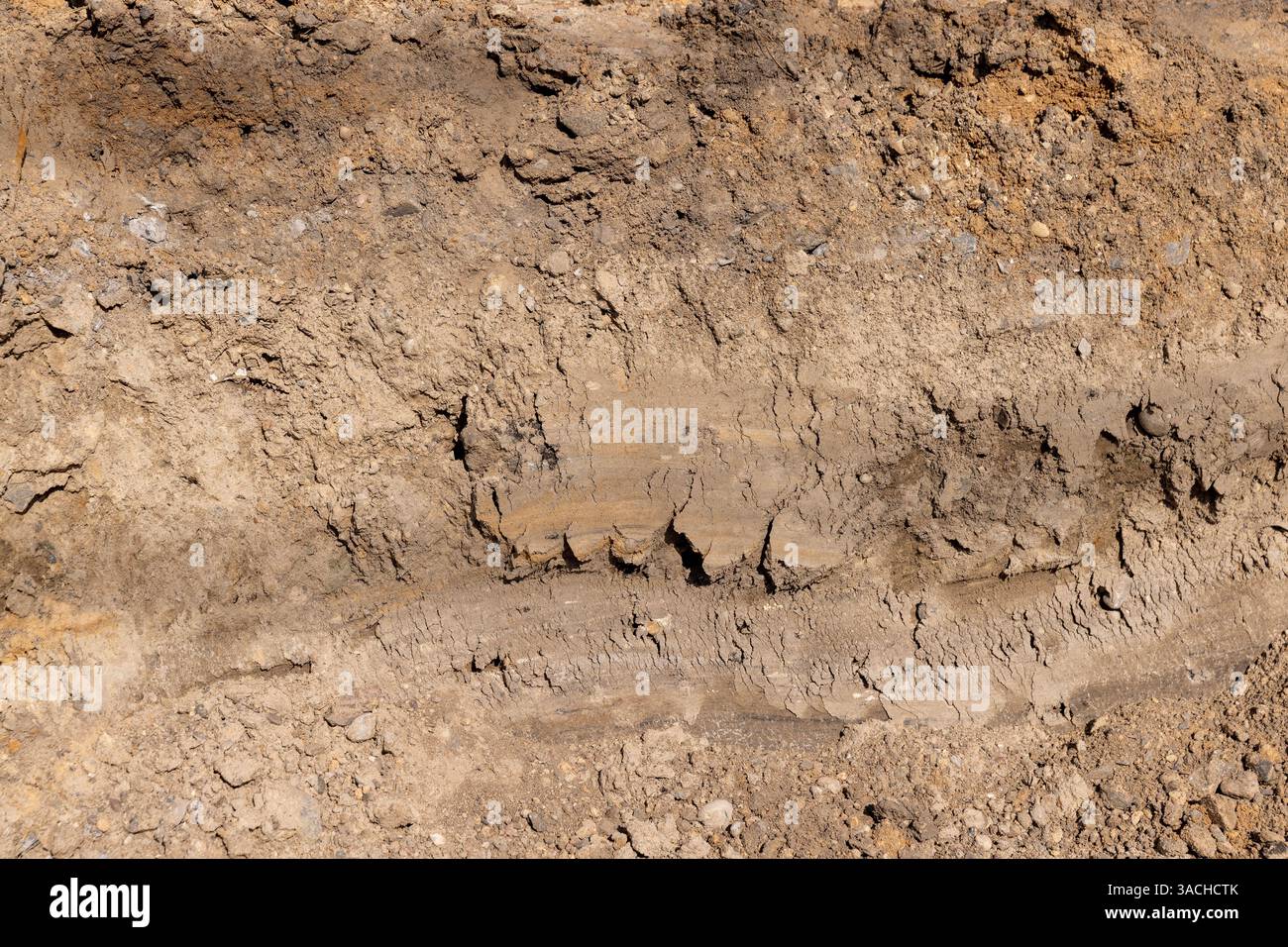 a pit for laying different layers of materials before asphalting a road ...