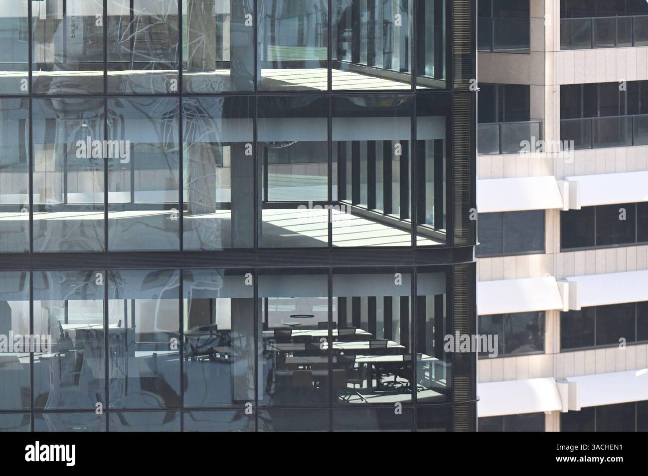 Empty floors of office space are seen in a building in Sydney, Friday ...