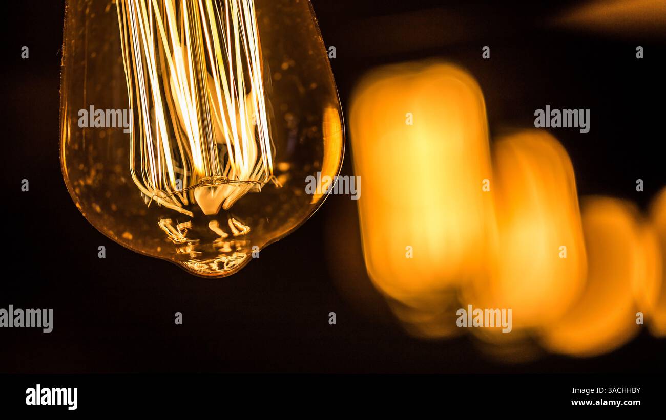 Captivating Close-Up of an Illuminated Edison Bulb with Glowing ...