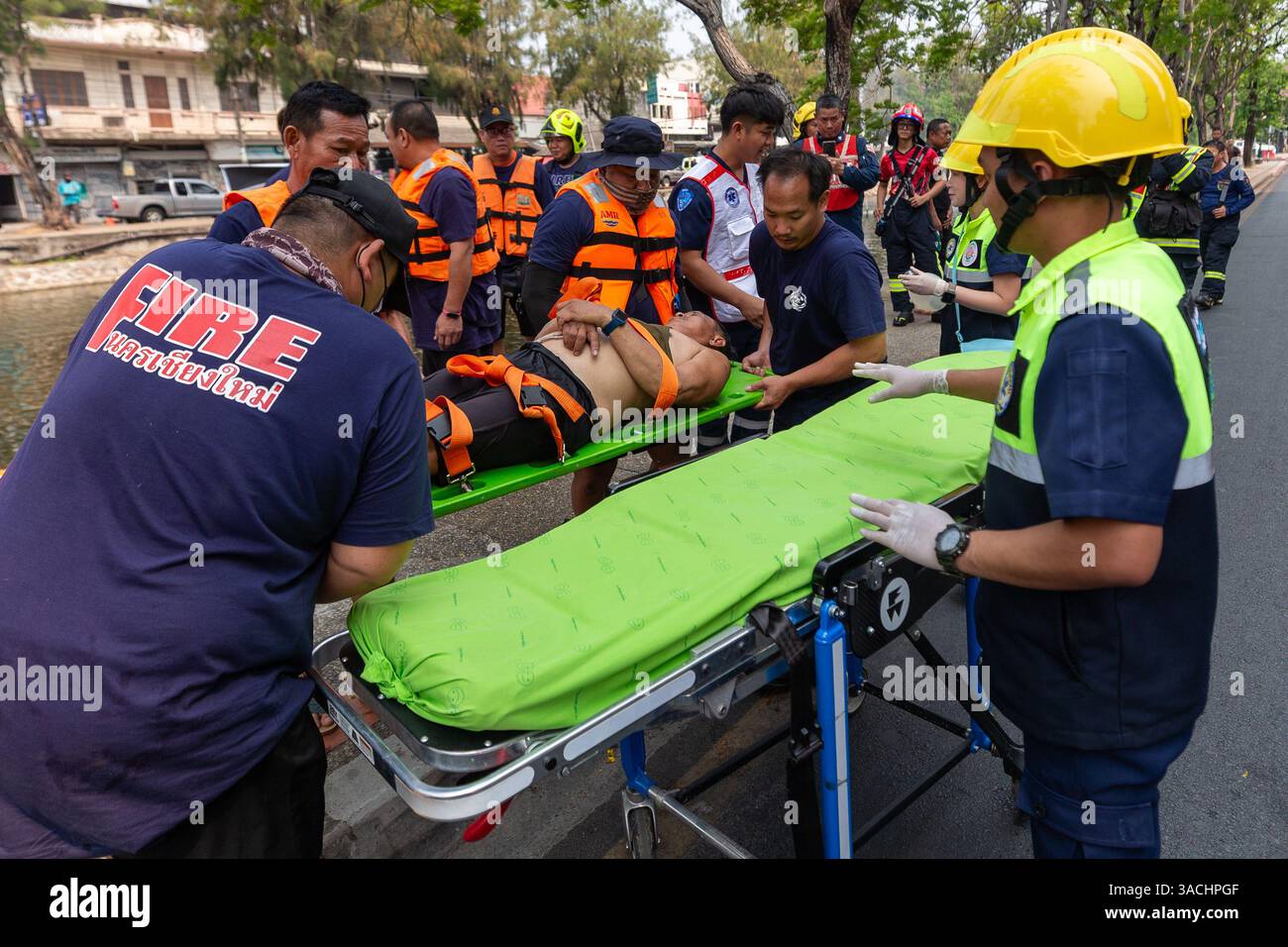 Disaster prevention and mitigation officers are seen practicing water ...
