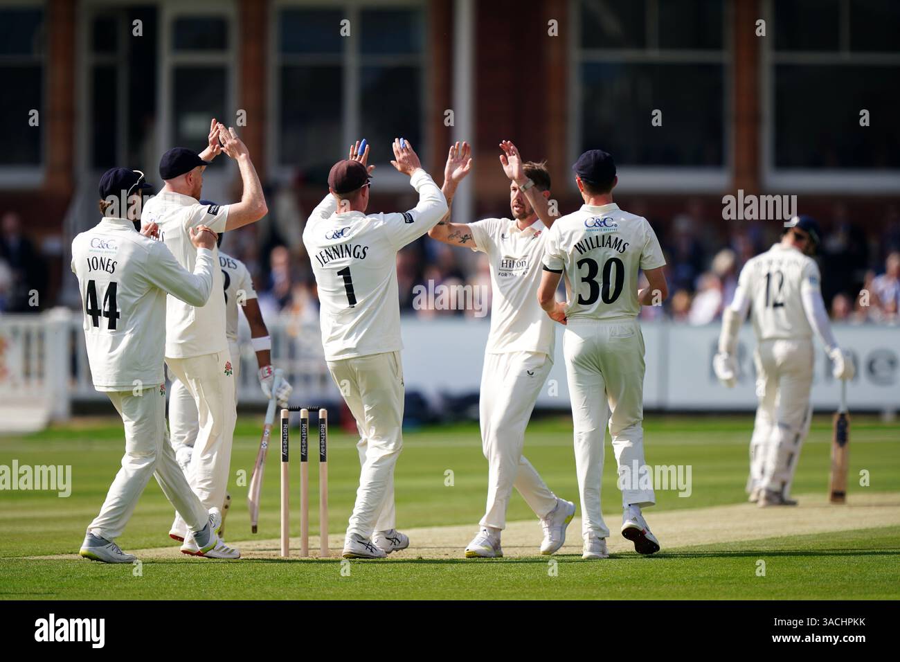 Lancashire players celebrate taking the wicket of Middlesex's Nathan ...