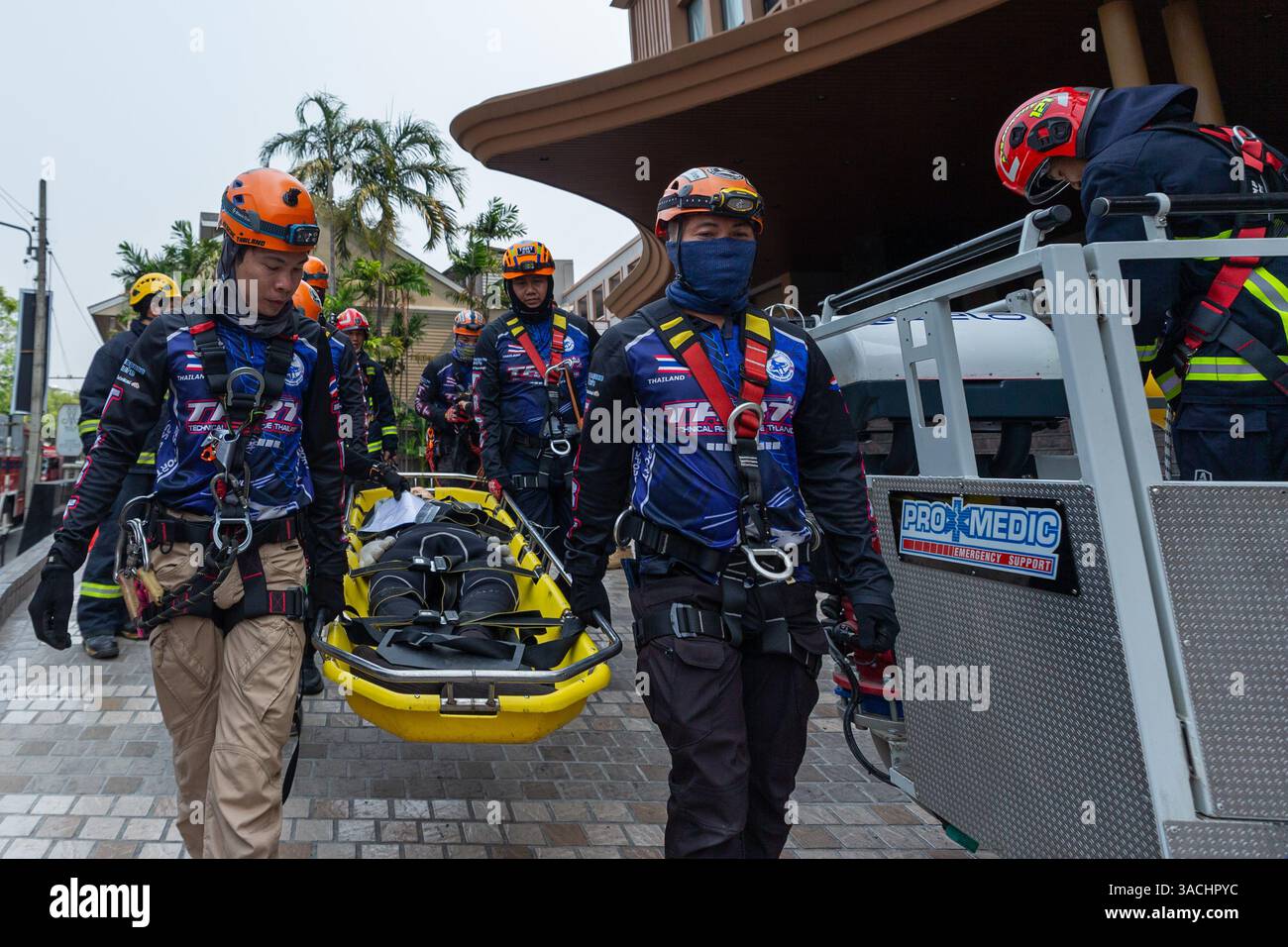 One of the drill participants is carried by disaster prevention and ...
