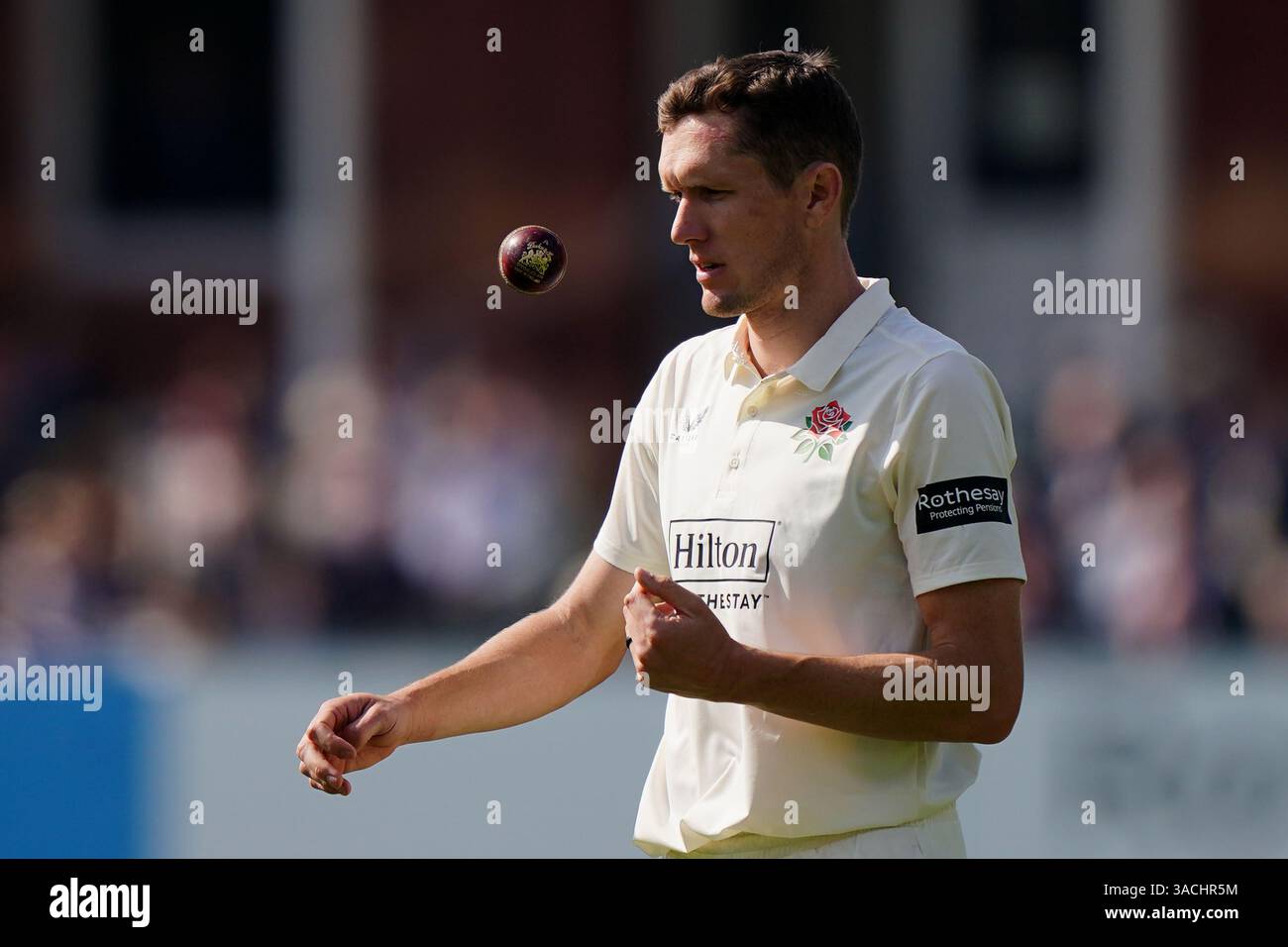 Lancashire's Will Williams prepares to bowl on day one of the Rothesay ...
