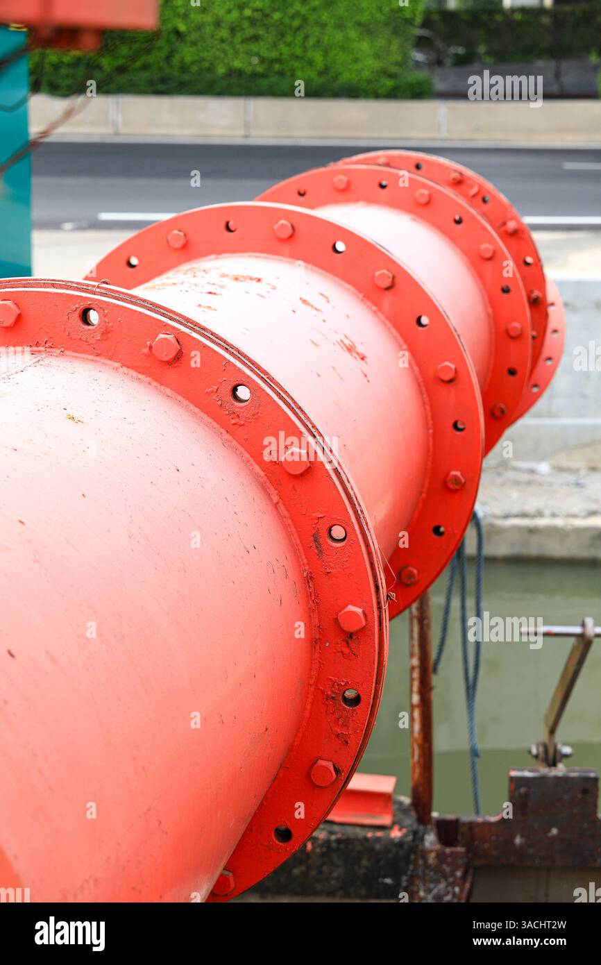 Large orange water pump pipe with Rust of metals. Corrosion of metal ...