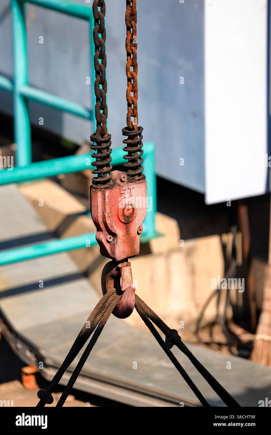 Red 5 Tons Industrial hook with chains or chain hoist on duty at ...