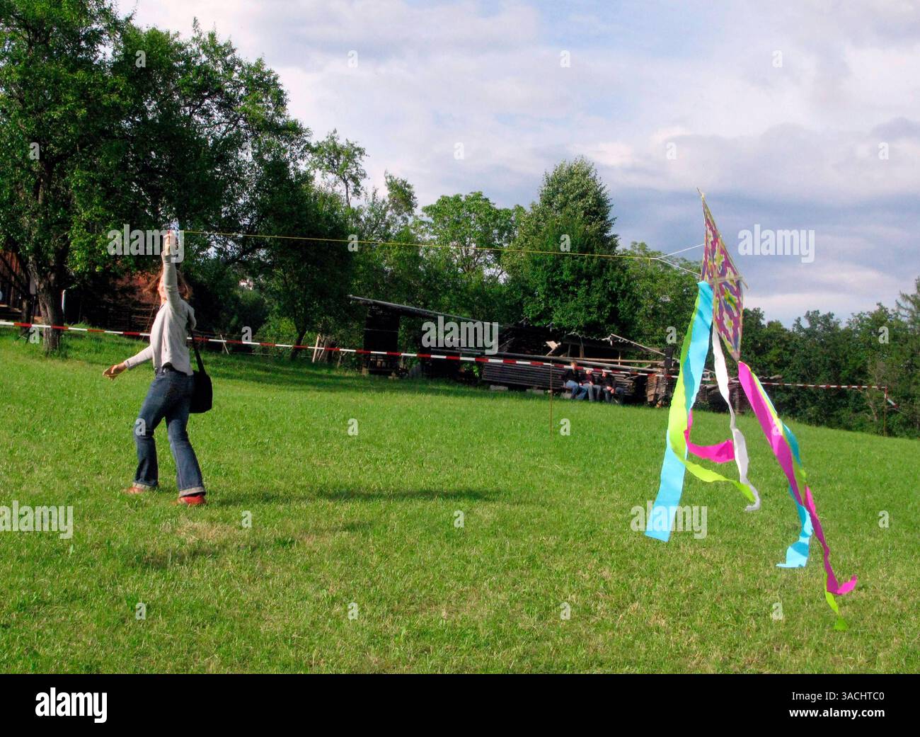 kite flying as a summer leisure activity in windy weather conditions ...