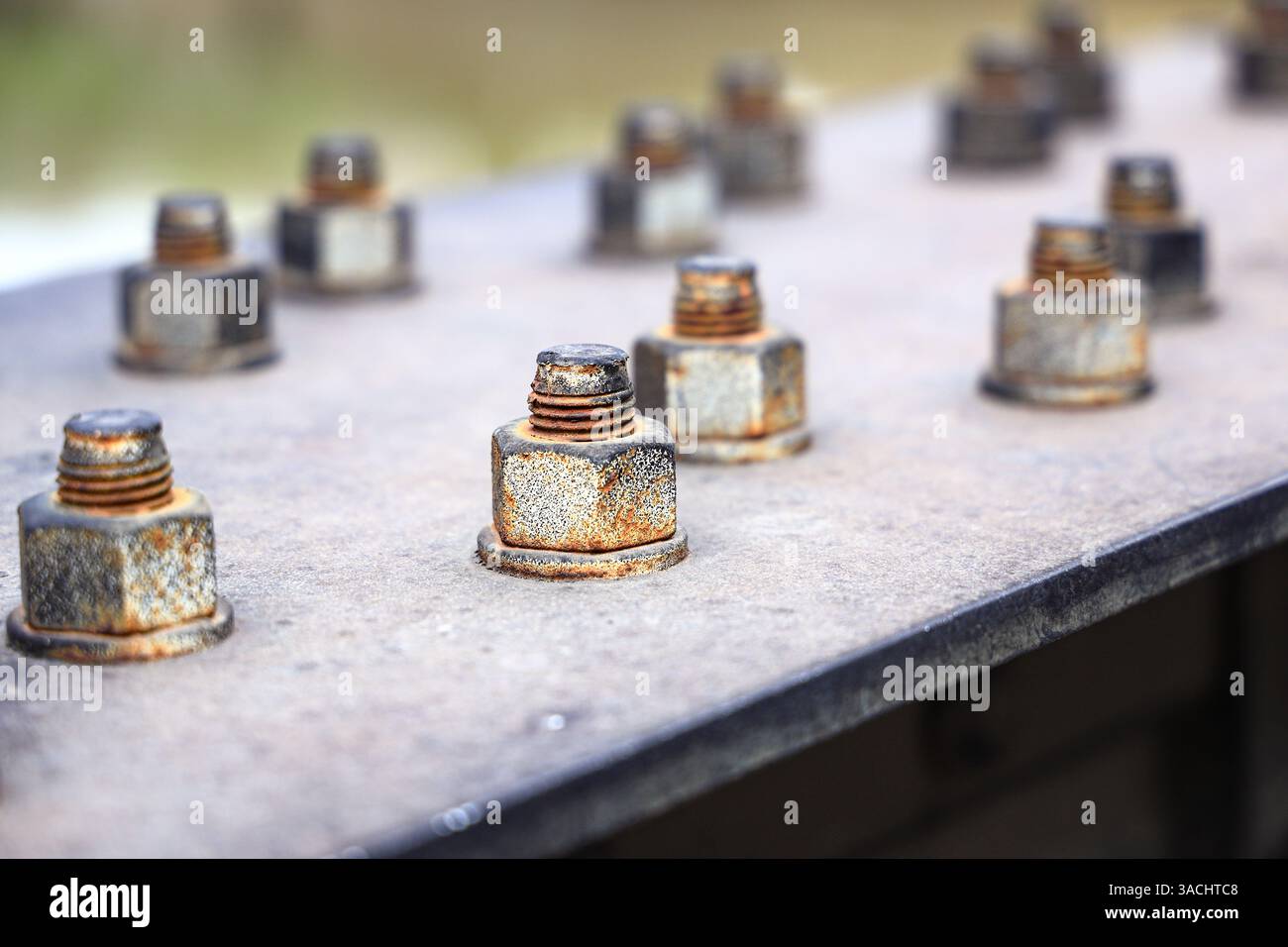 Metal supports Bolts, nuts, threaded on beams of the Steel Construction ...