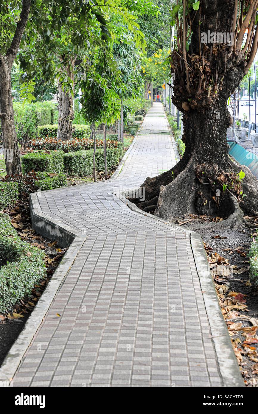 Long paved brick footpath, Brick path or sidewalk with perspective ...