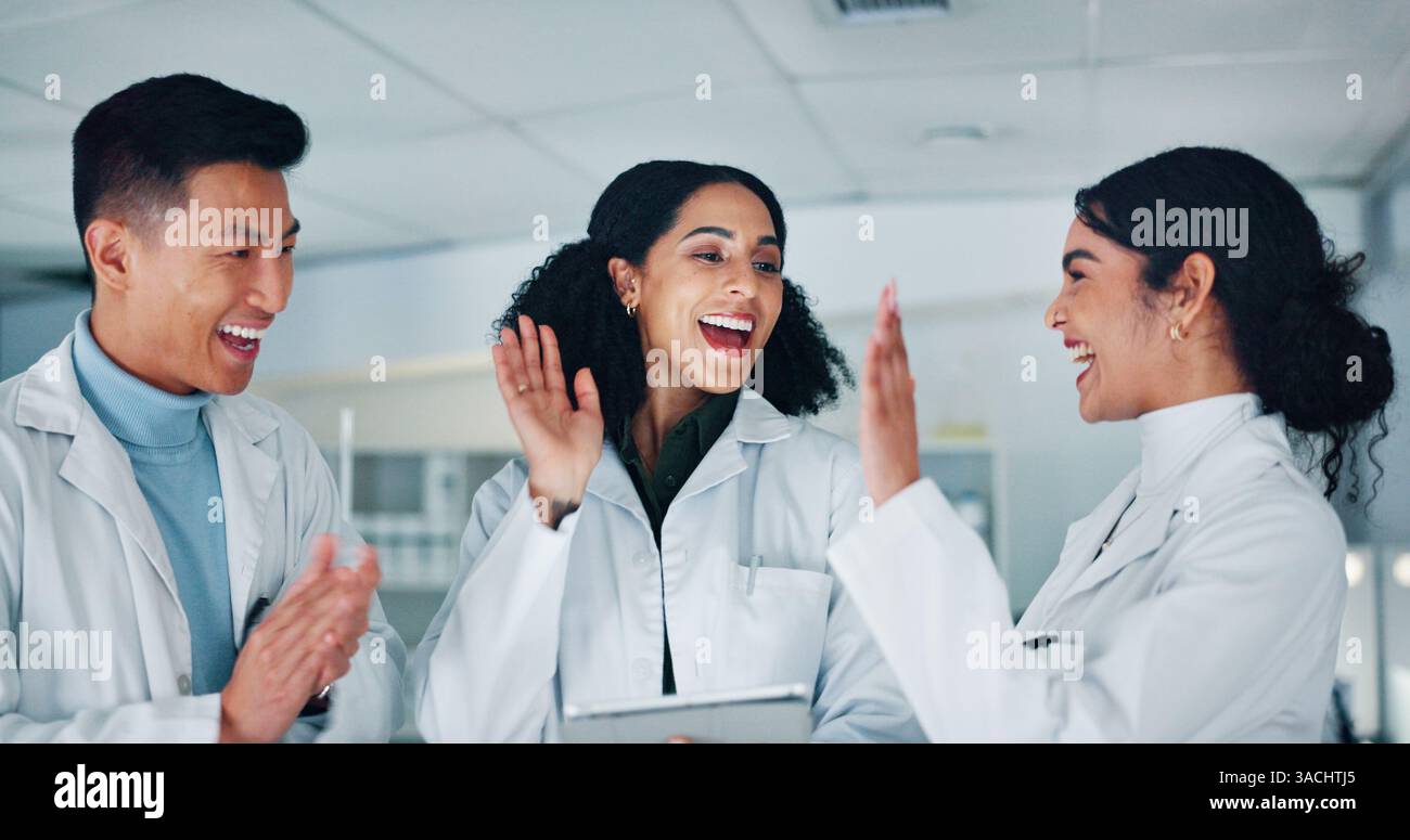 High five, teamwork and scientists in laboratory with medical project ...