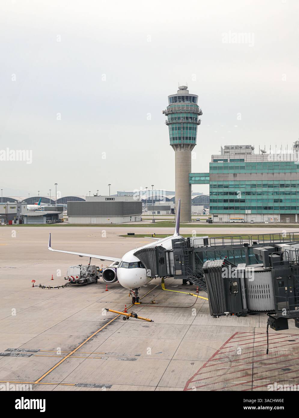 Airport baggage tug (baggage dolly transport) on duty and Ground ...
