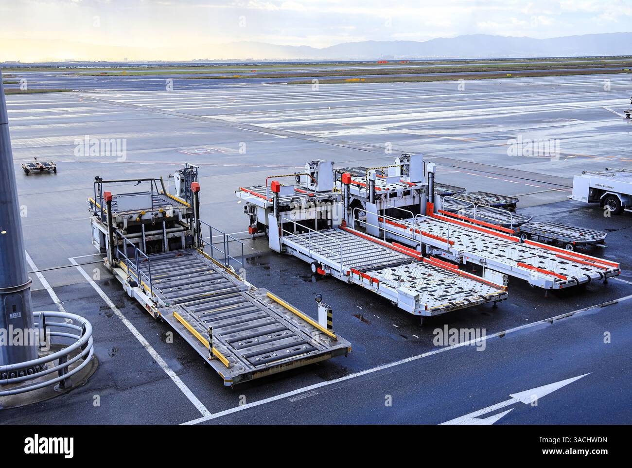 Ground support equipment, Baggage Tug( baggage dolly transport ) standby for services in Apron ...