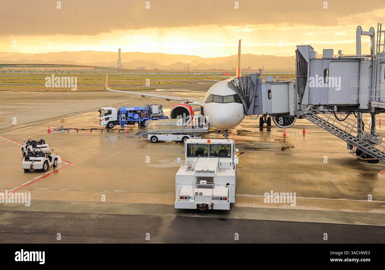 Airport baggage tug (baggage dolly transport) on duty and Ground ...