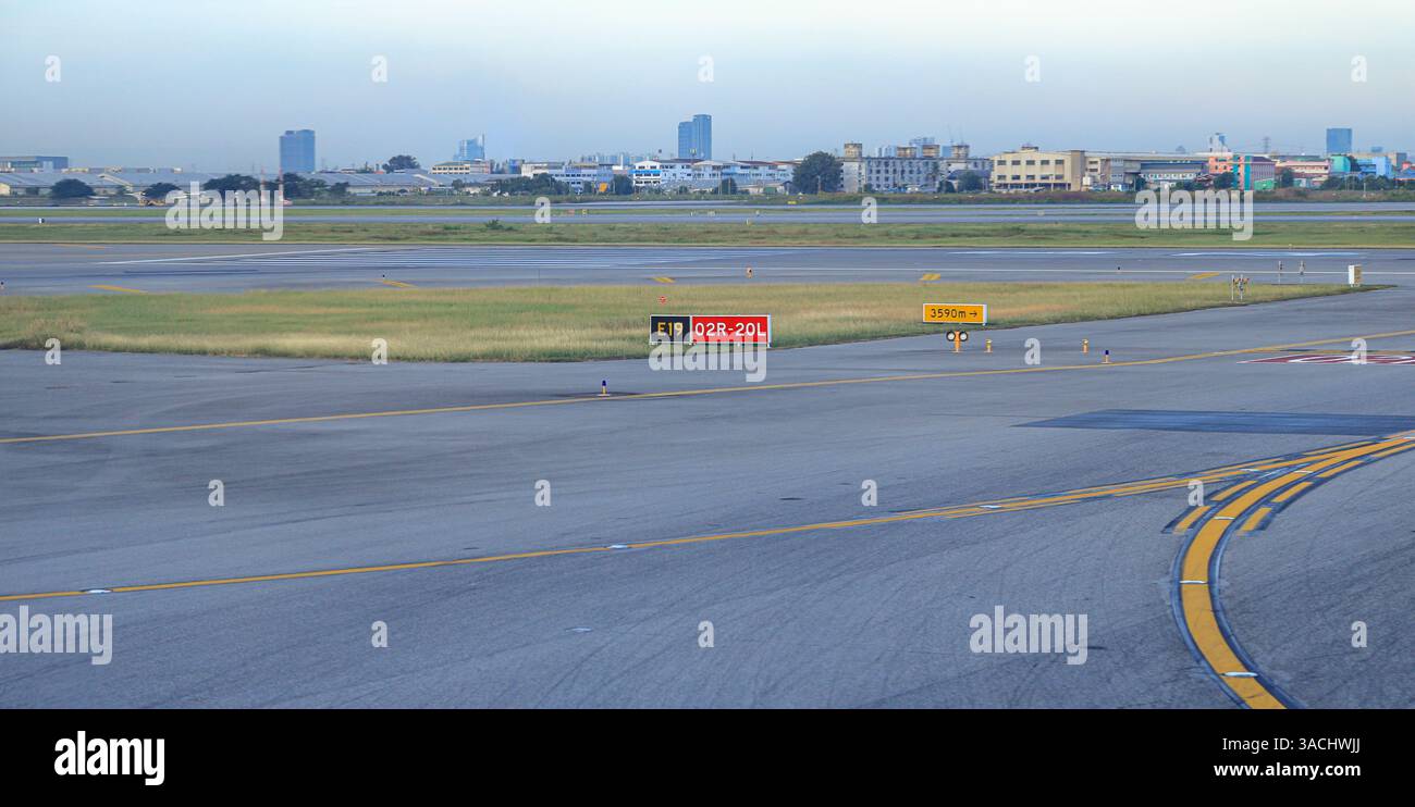 sign markings on taxiway for plane direction in taxiway at ...