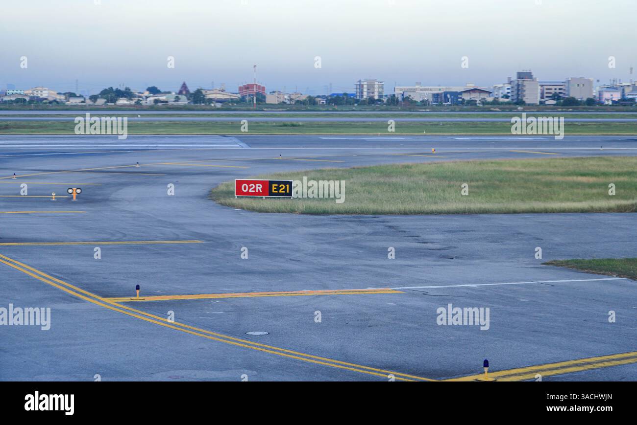 sign markings on taxiway for plane direction in taxiway at ...