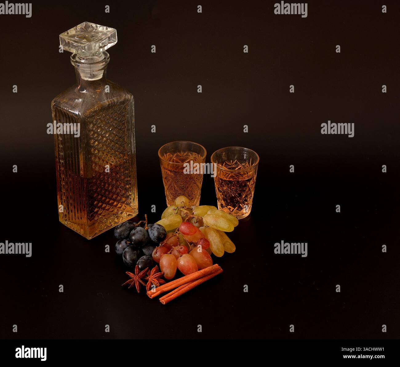 Grappa from different grape varieties with cinnamon and anise in two ...