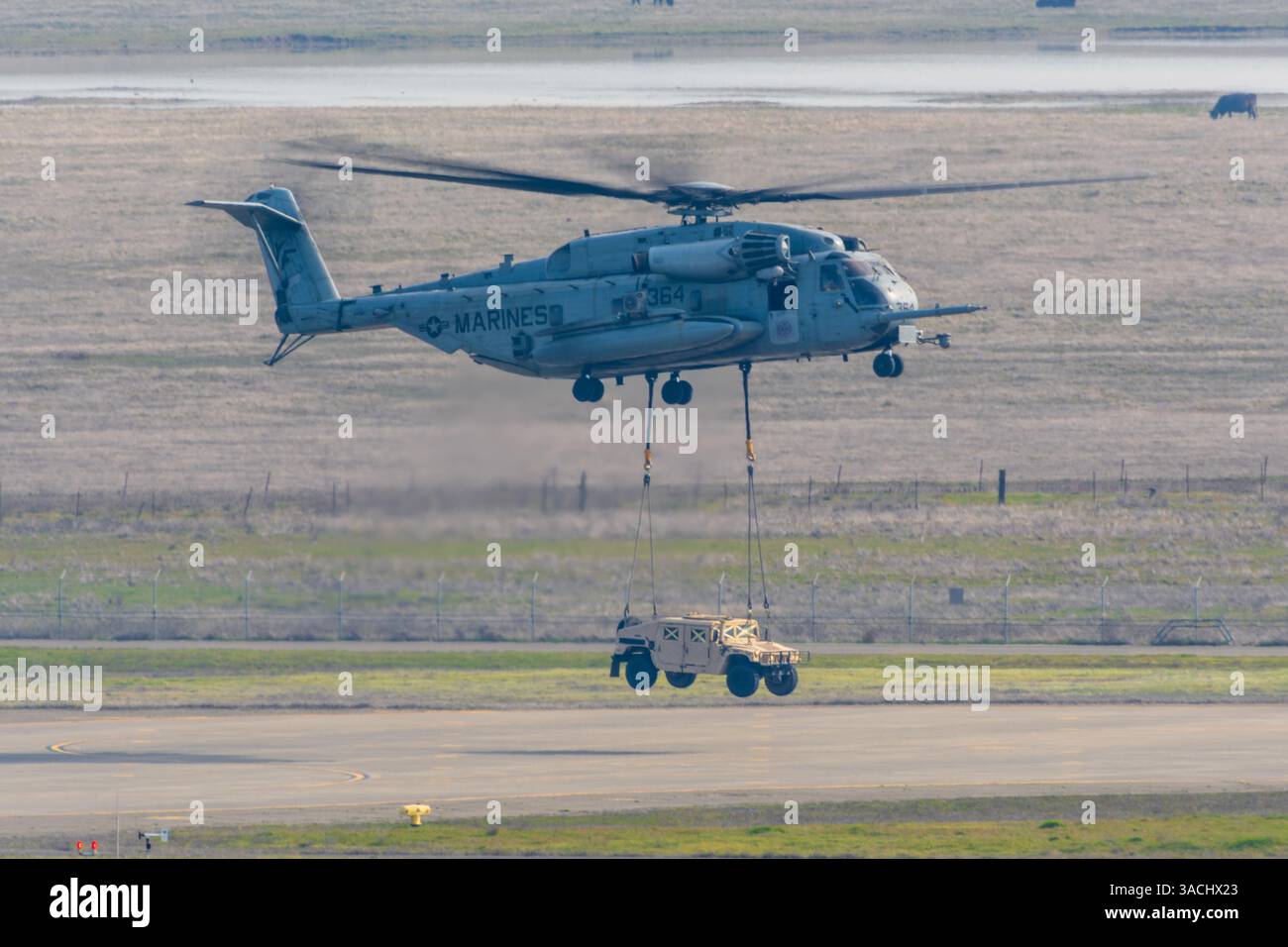 A U.S. Marine Corps CH-53E Super Stallion assigned to 3rd Marine ...
