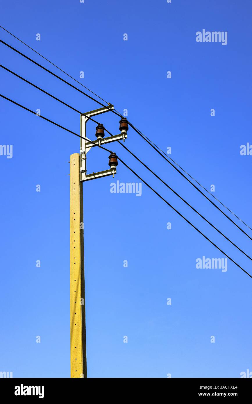High voltage post, High voltage tower, show with high voltage construction and power lines Stock ...