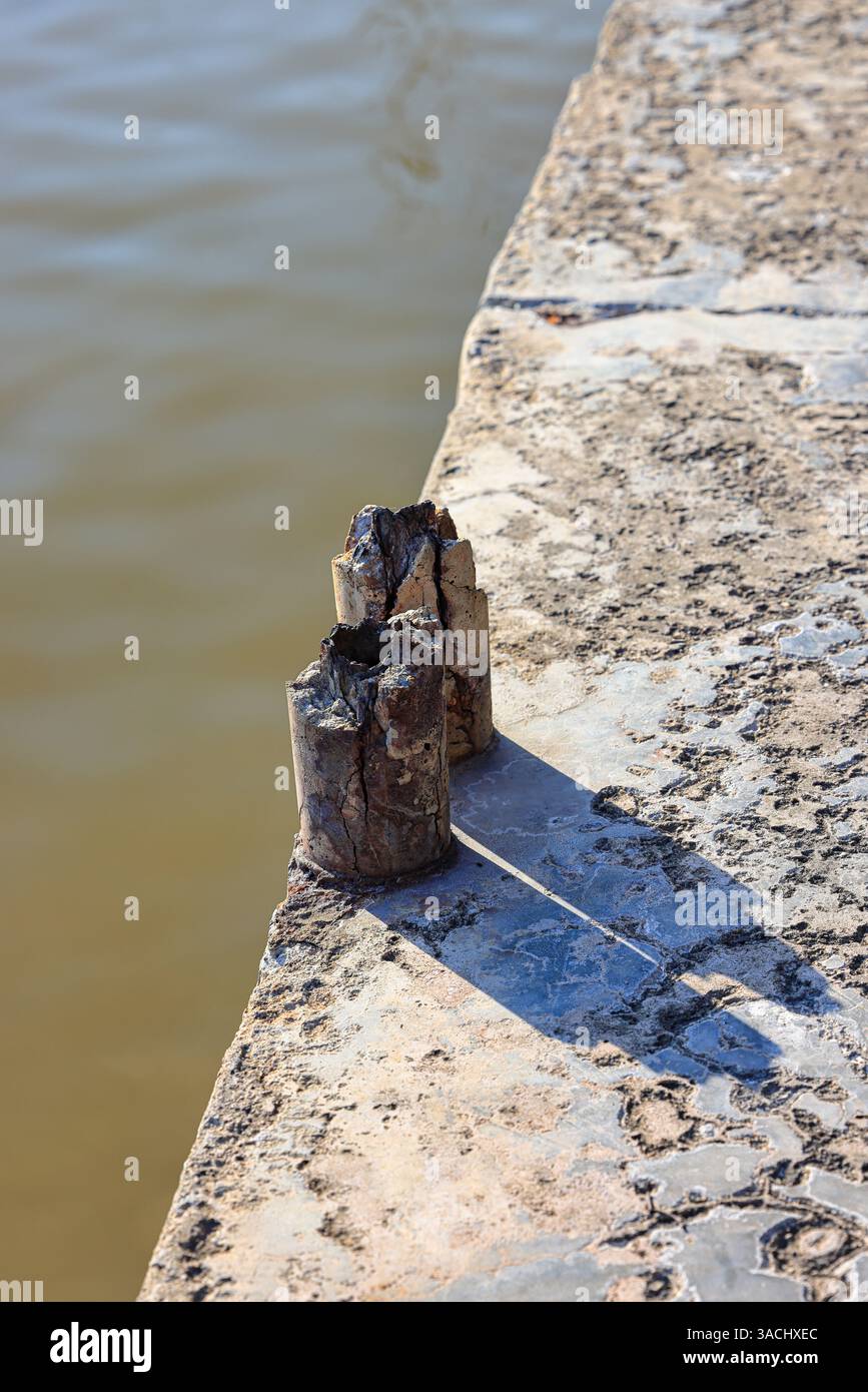 Cracked Reinforced concrete bridge railing visible internal ...
