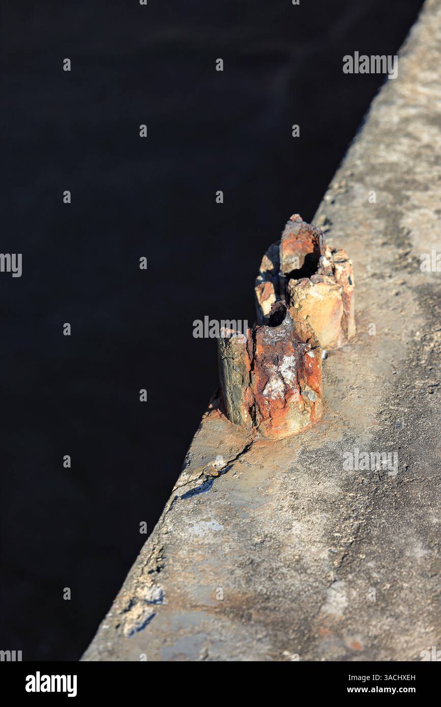 Cracked Reinforced concrete bridge railing visible internal ...
