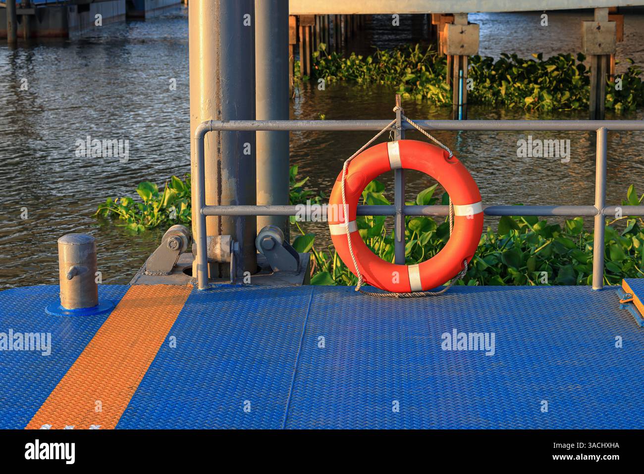 A rescue lifebuoy which installed on riverbank corridor railing, stand ...