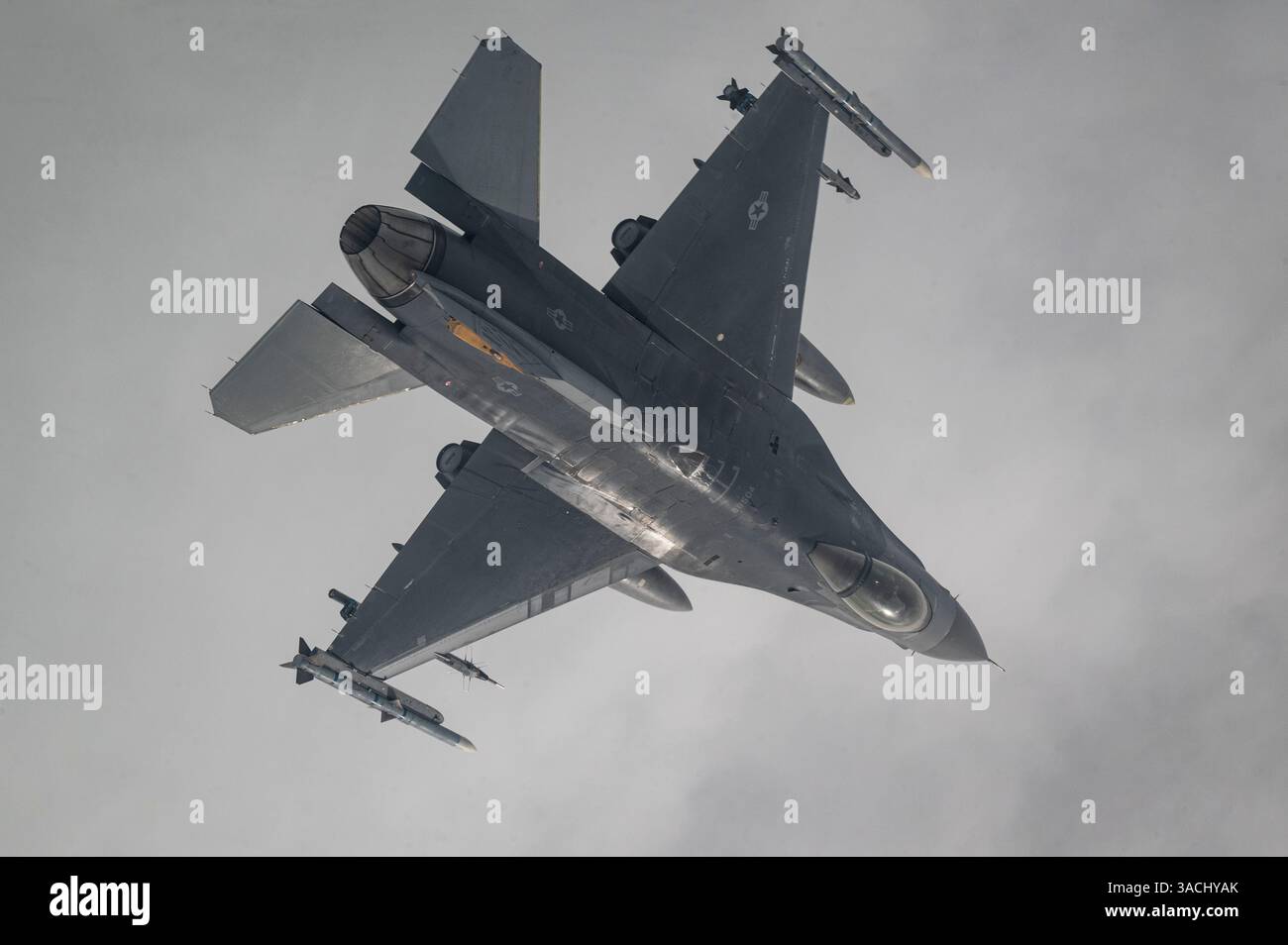 An F-16 Fighting Falcon aircraft assigned to the 80th Fighter Squadron ...