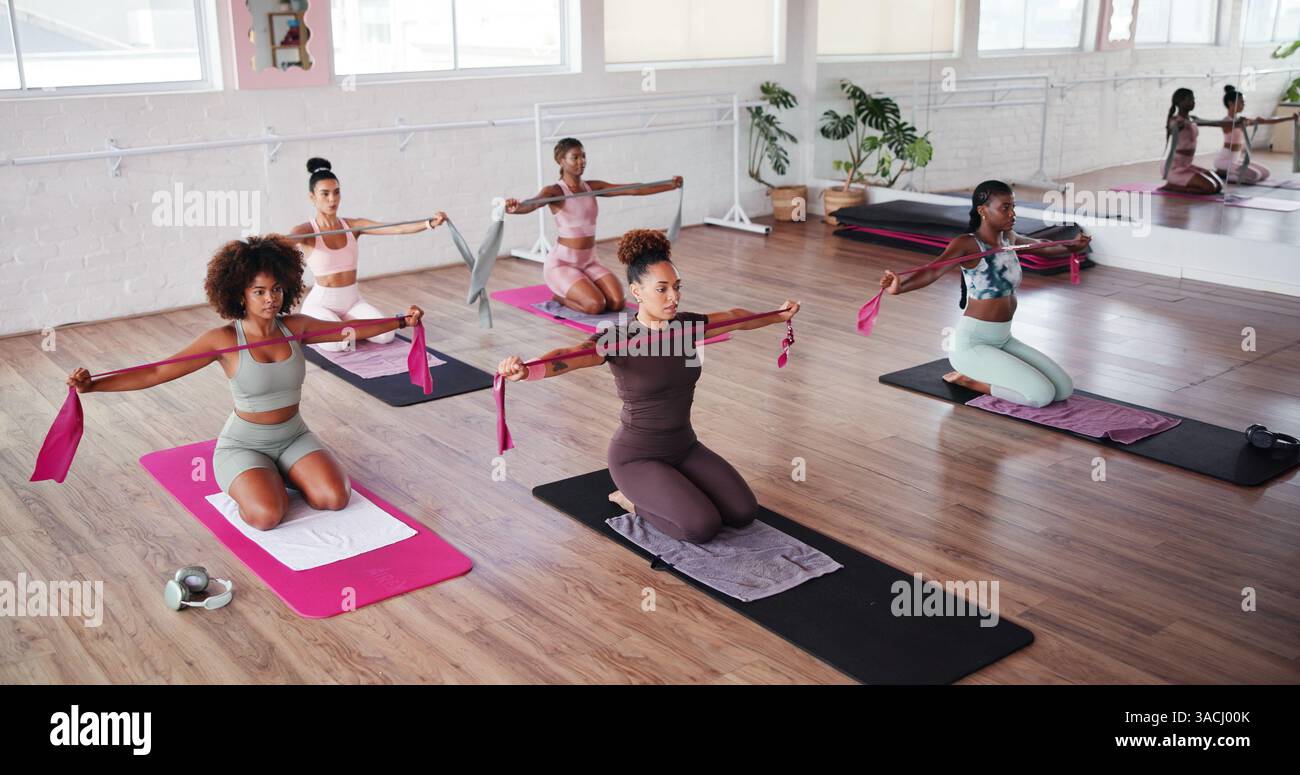 Pilates, exercise and people with resistance band in class for training ...