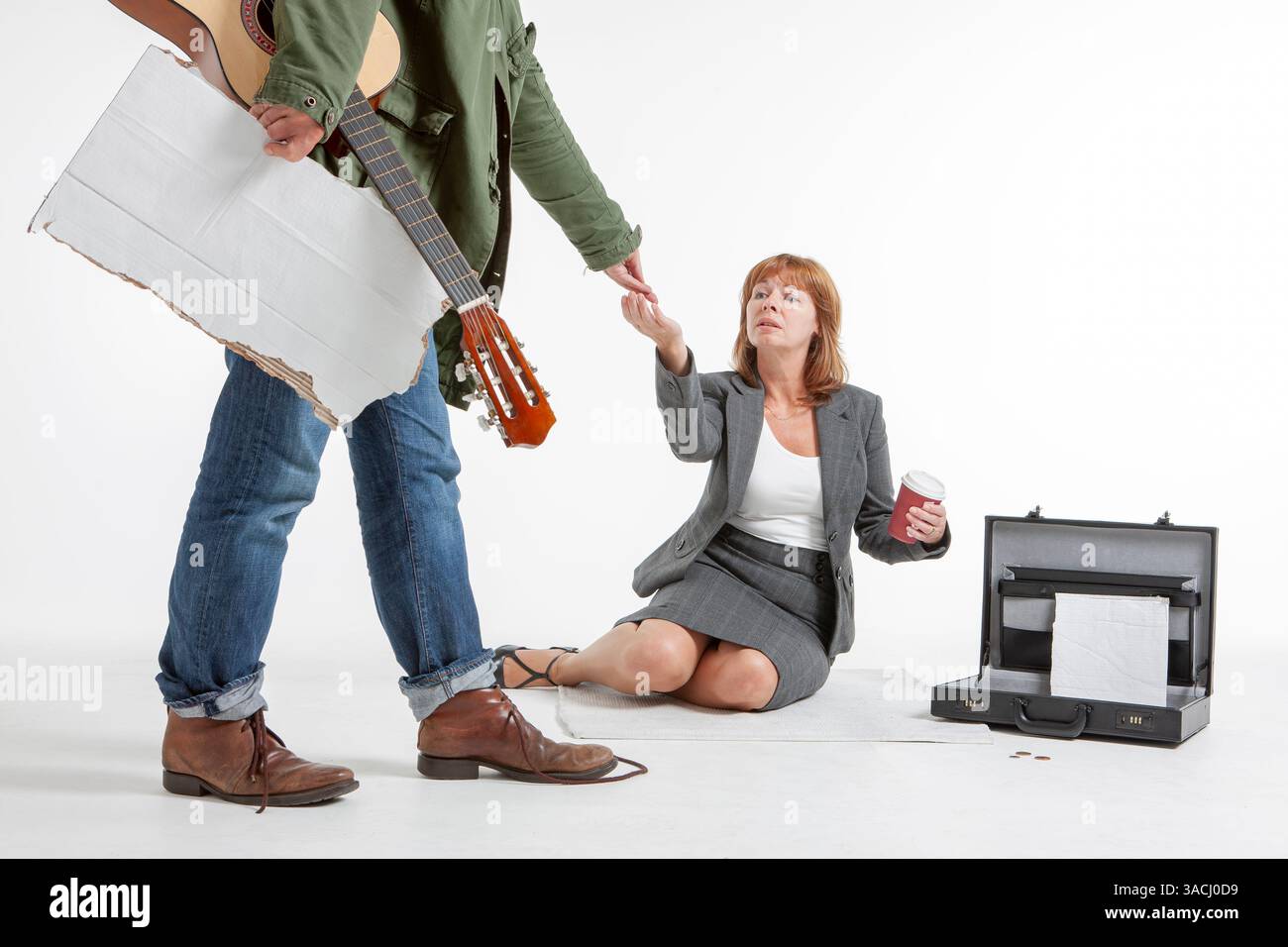 A smartly dressed mature business woman down on her luck receiving a ...