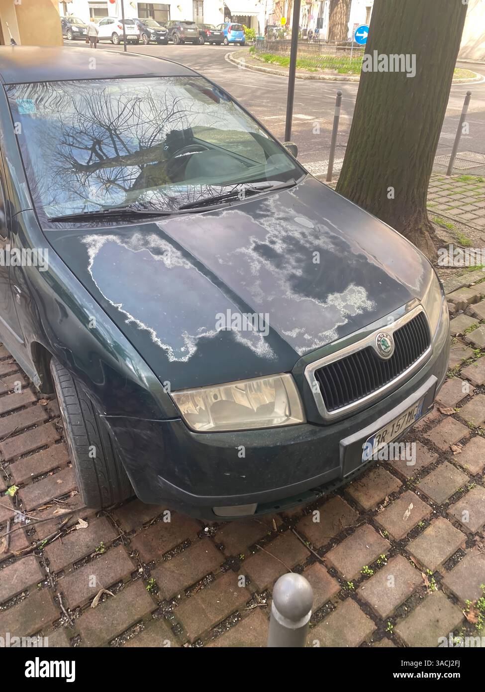 Crema, Italy - March 2nd 2025 Parked on a cobblestone street in an ...
