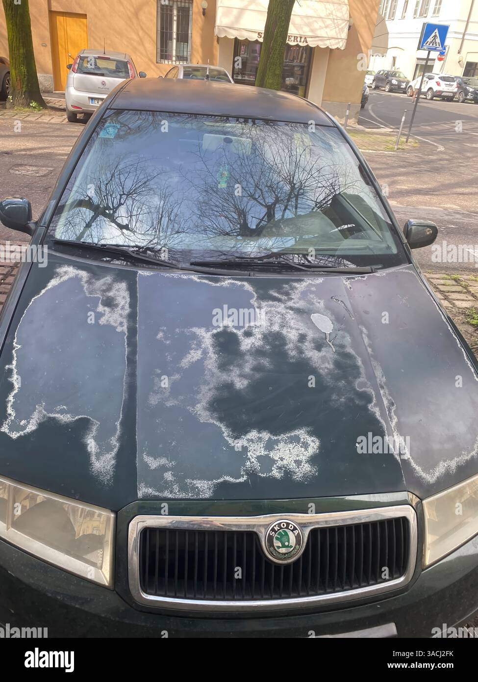 Crema, Italy - March 2nd 2025 Parked on a cobblestone street in an ...