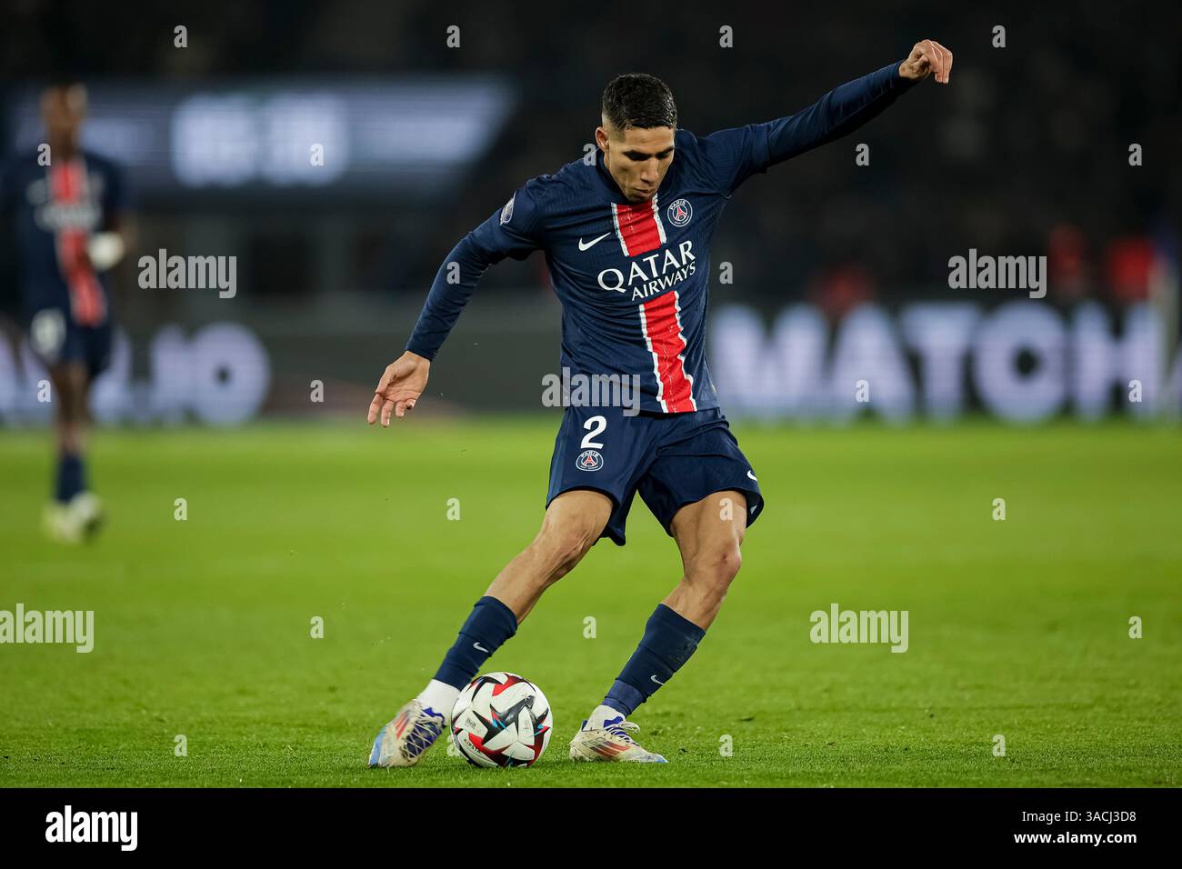 Achraf Hakimi of Paris Saint-Germain attempts a kick during the Ligue 1 ...