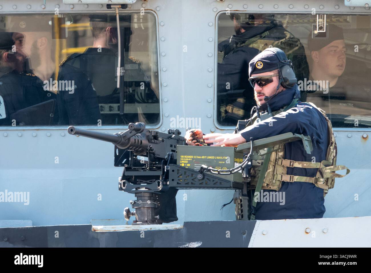 Hamburg, Germany. 04th Apr, 2025. A Royal Navy sailor stands next to a ...