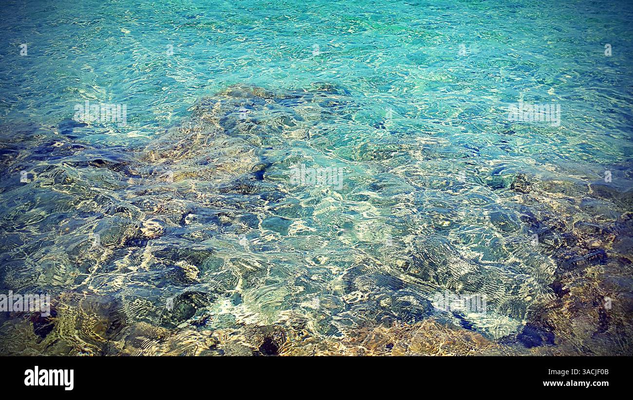 Transparent water rocky shore hi-res stock photography and images - Alamy