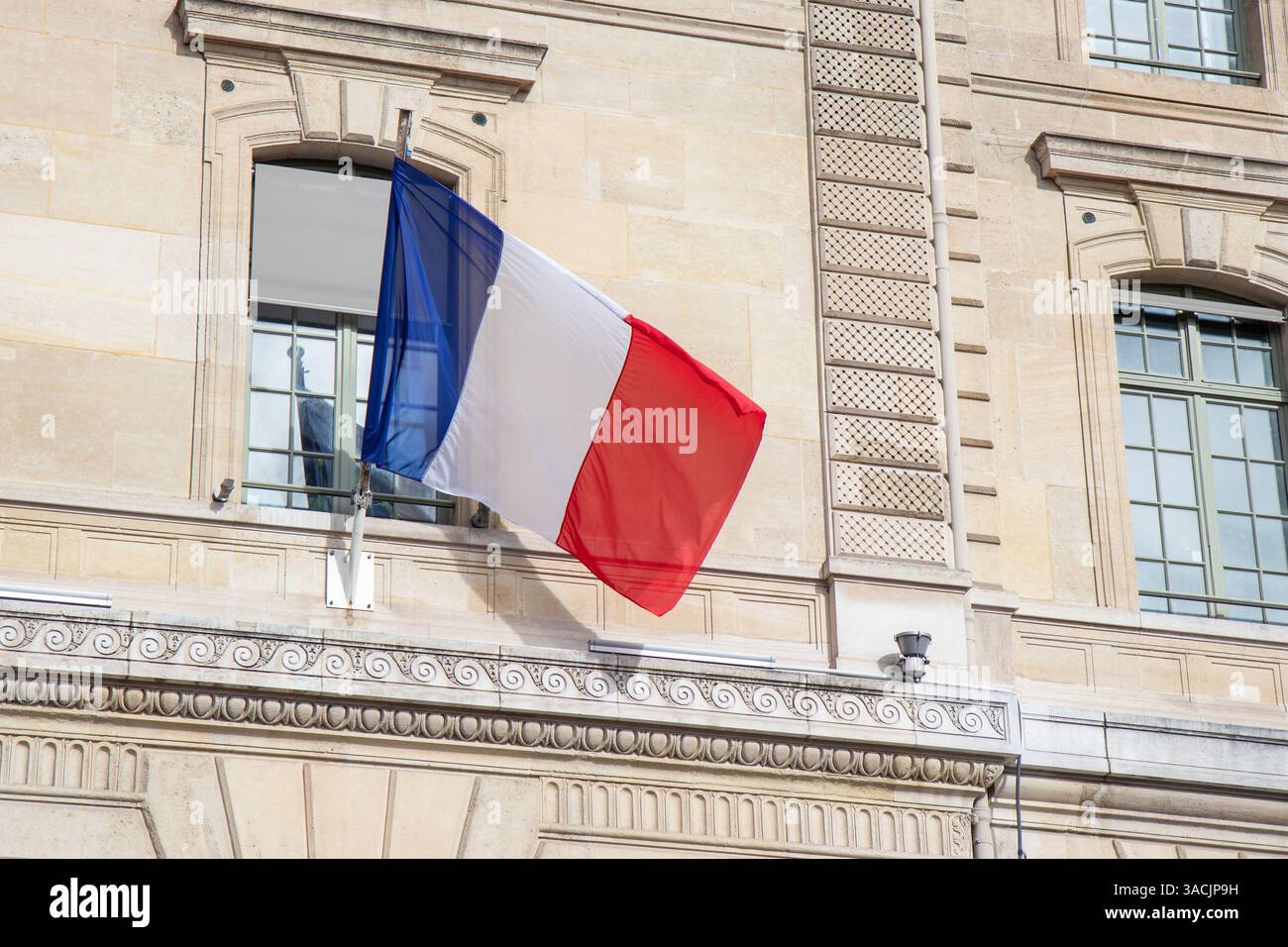 Paris, France, February 22nd, 202: A French flag waves proudly on a ...