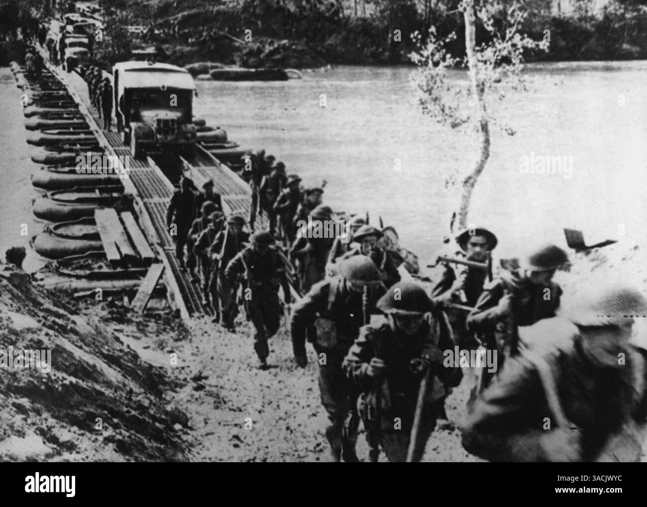 Fifth Army Crossing The Volturno - British Infantry crosses a Pontoon ...