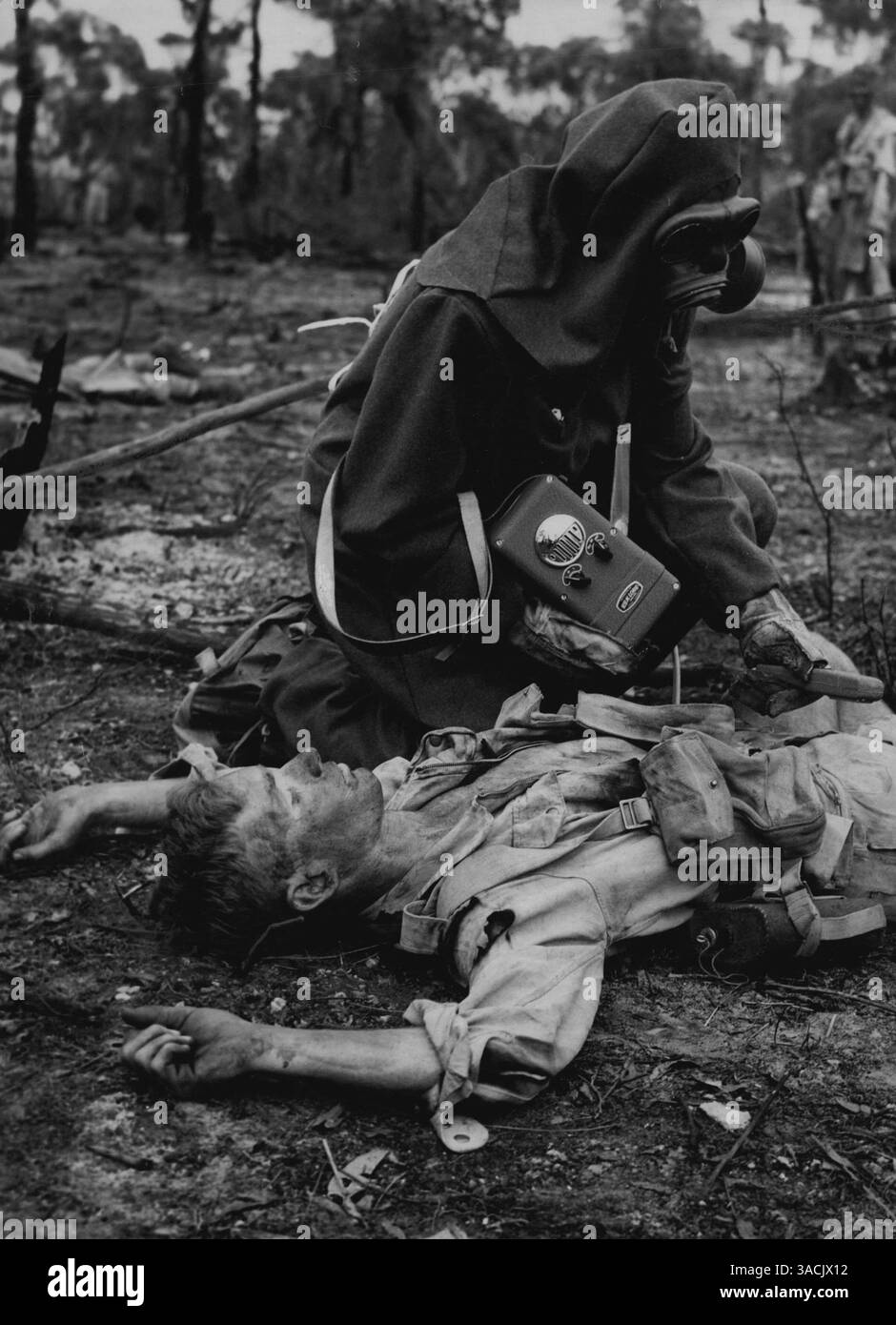 Atom Bomb Training -- Cpl. N G Lonergan dressed in a replica of anti ...