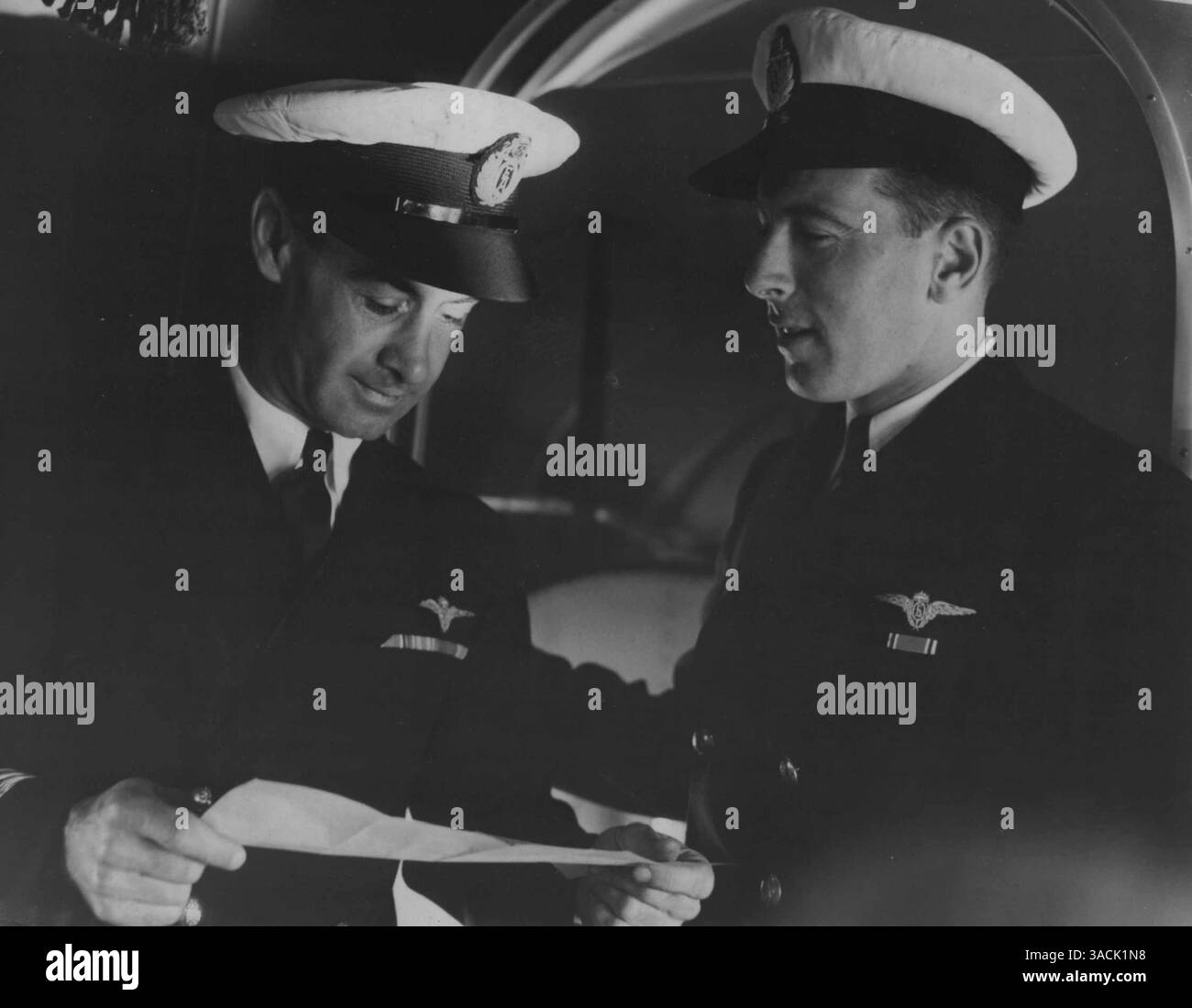 Jim (H.F.) Broadbent (right) Now a flying boat pilot Scotty Allan (left ...