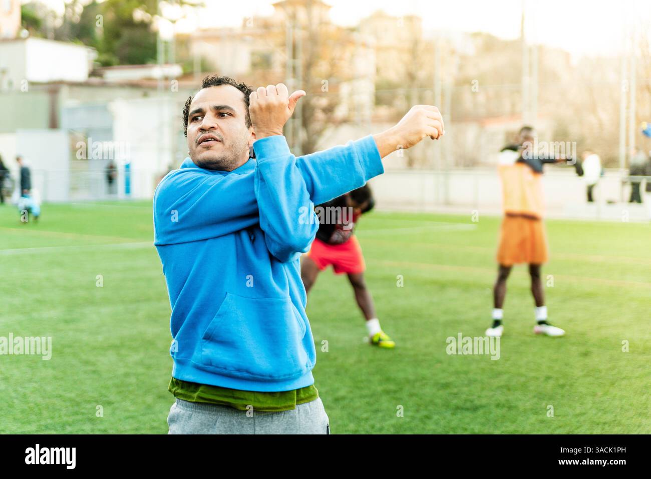Young middle east arab man training in a football pitch. Young athlete ...
