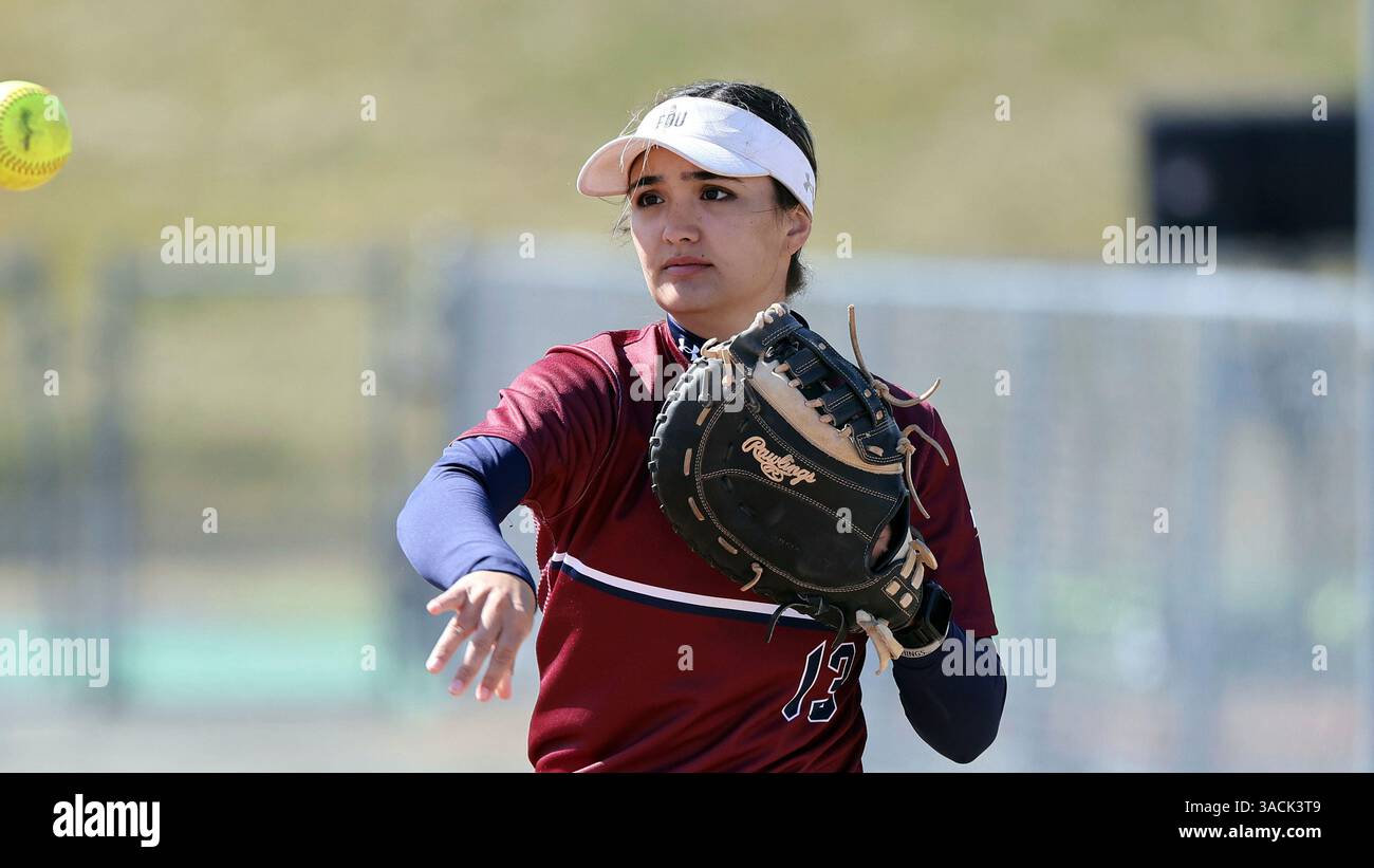 Fairleigh Dickinson infielder Ayden Stone (13) makes a throw during an ...