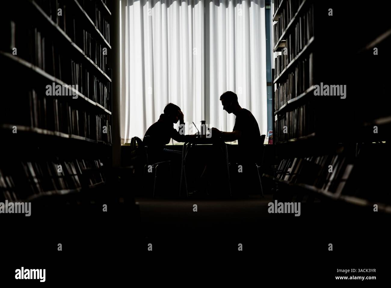 Berlin, Germany. 04th Apr, 2025. Two people sit at a table behind ...