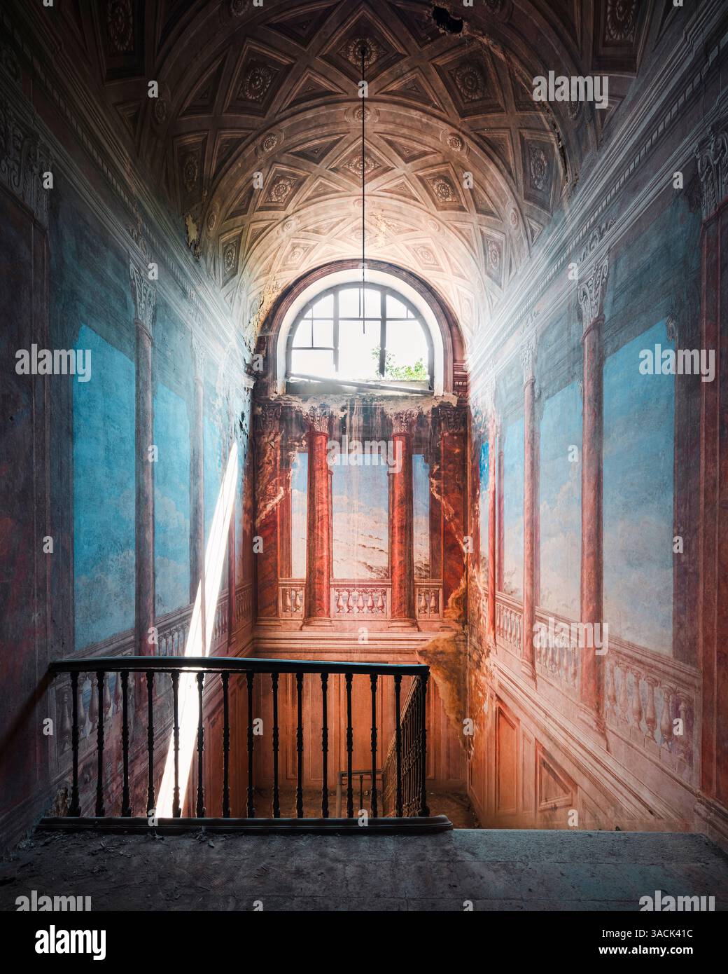 Decaying interior of an abandoned building with peeling paint and ...