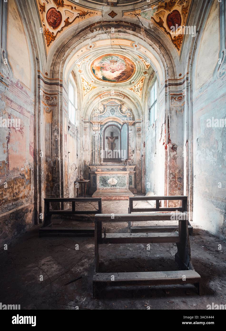 Decaying interior of an abandoned building with peeling paint and ...