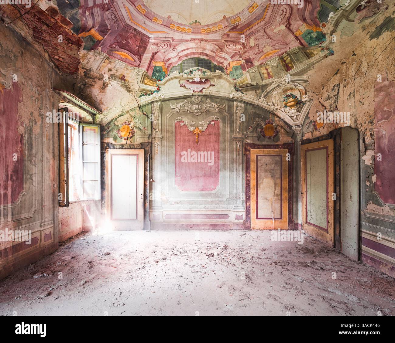 Decaying interior of an abandoned building with peeling paint and broken windows — a glimpse ...