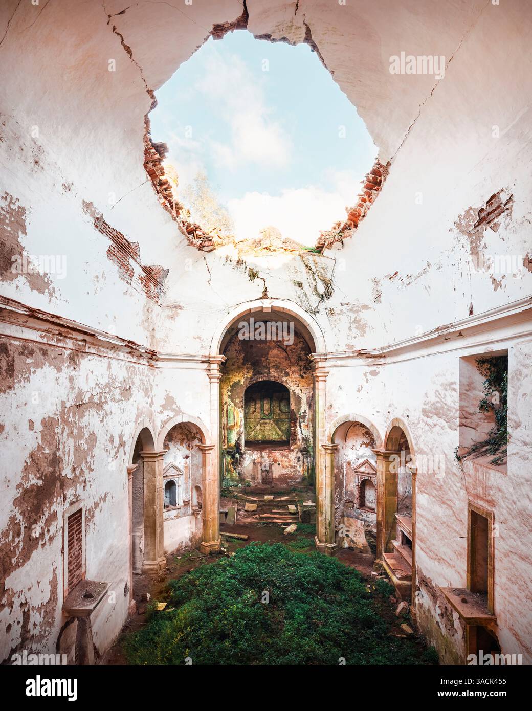 Decaying interior of an abandoned building with peeling paint and ...