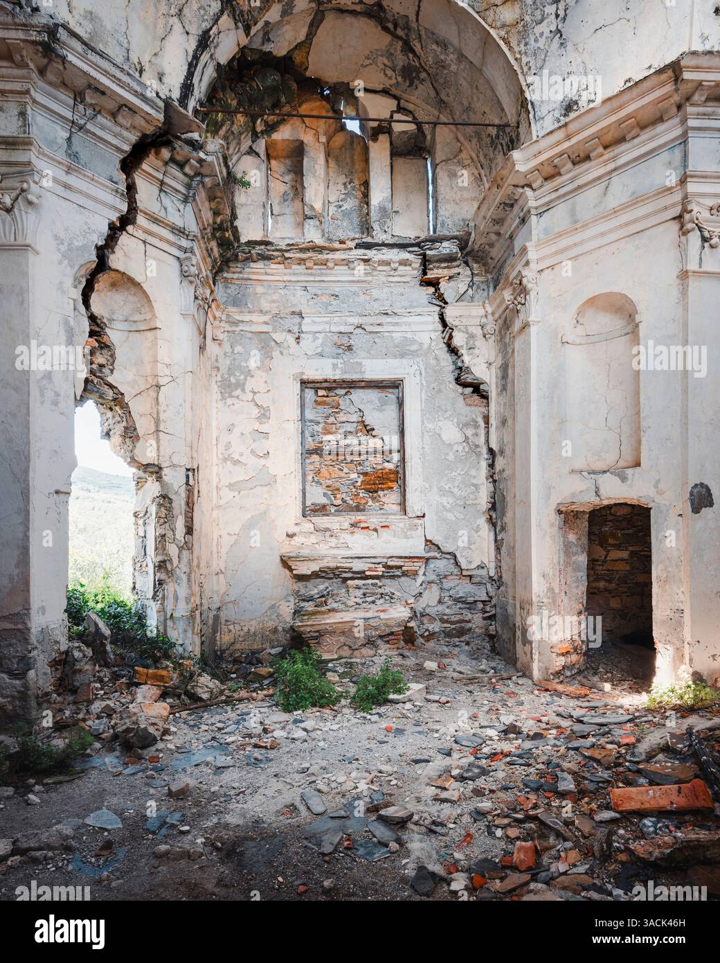 Decaying interior of an abandoned building with peeling paint and ...