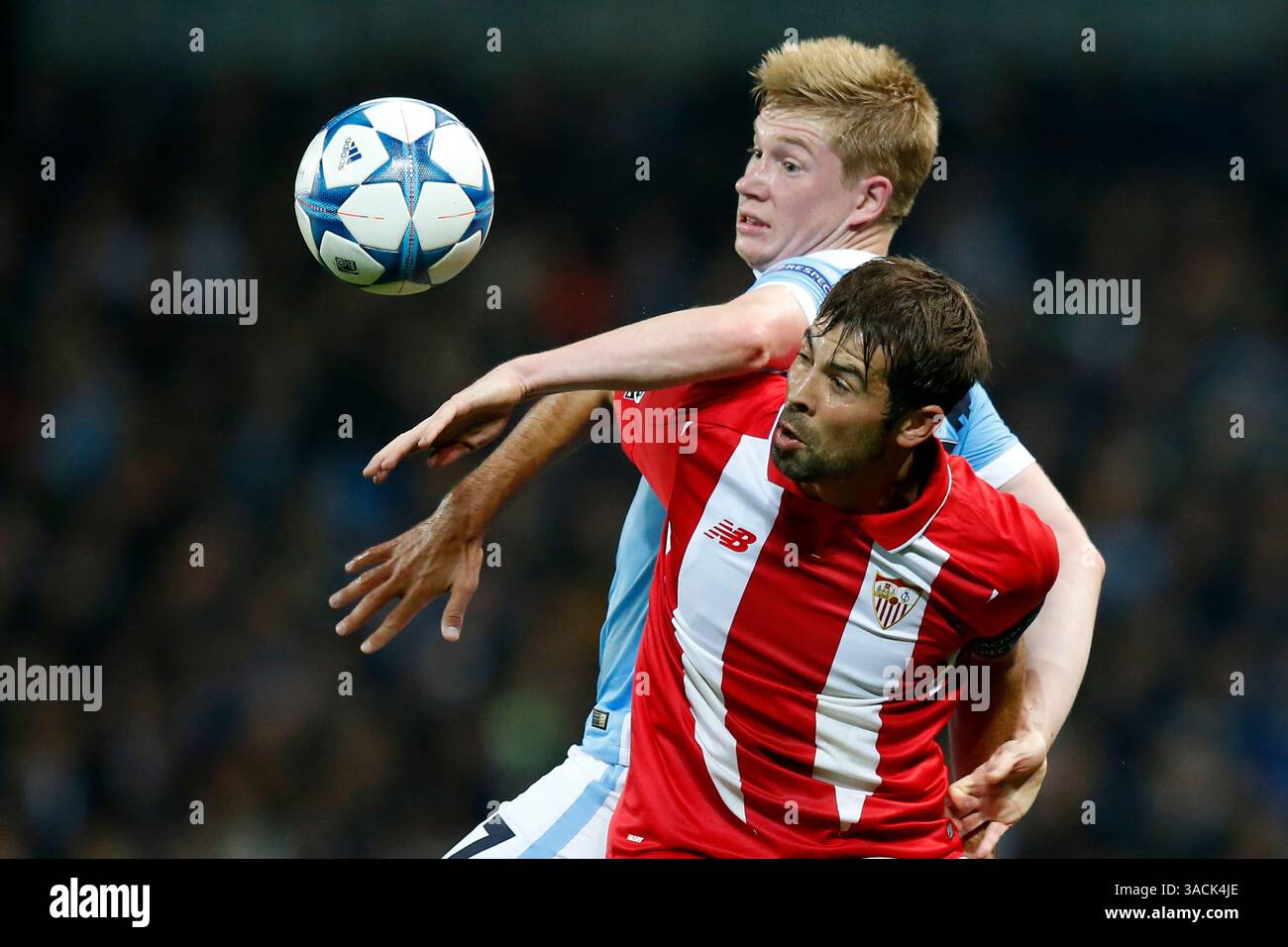 FILE -Manchester City's Kevin De Bruyne, left, and Sevilla's Coke fight ...