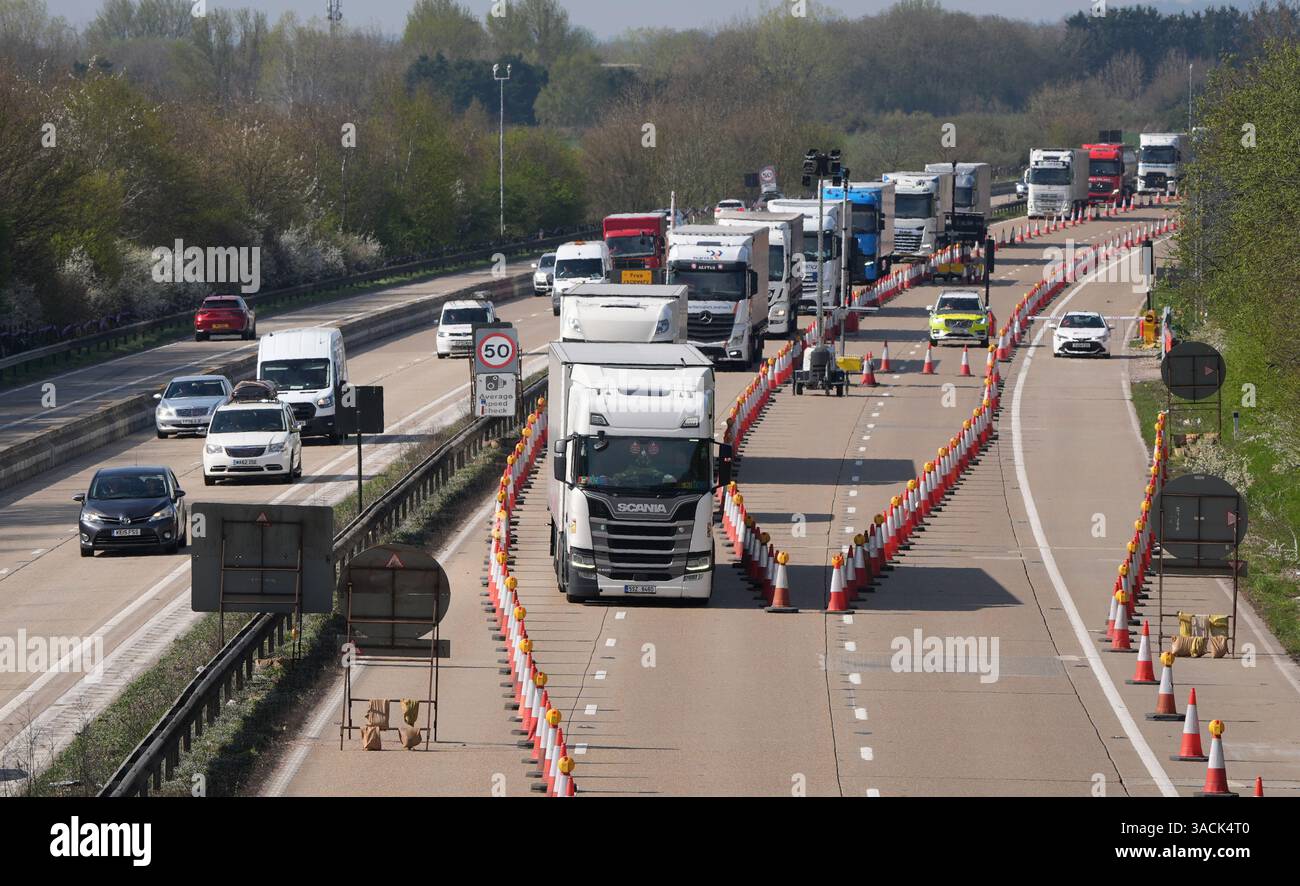 A view of lorries moving through Operation Brock on the M20 motorway ...