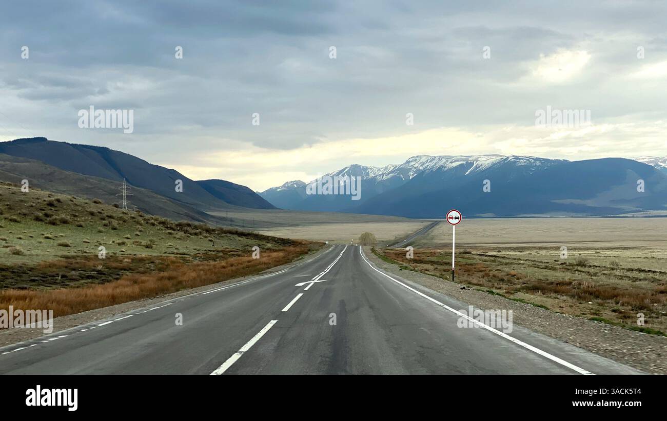 Straight asphalt road stretches hi-res stock photography and images - Alamy