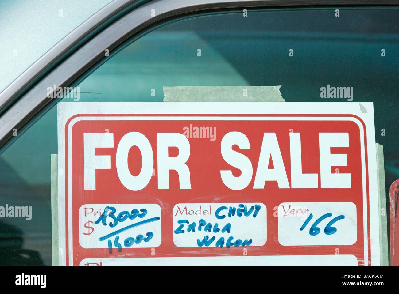 for sale sign on a used classic car window Stock Photo - Alamy