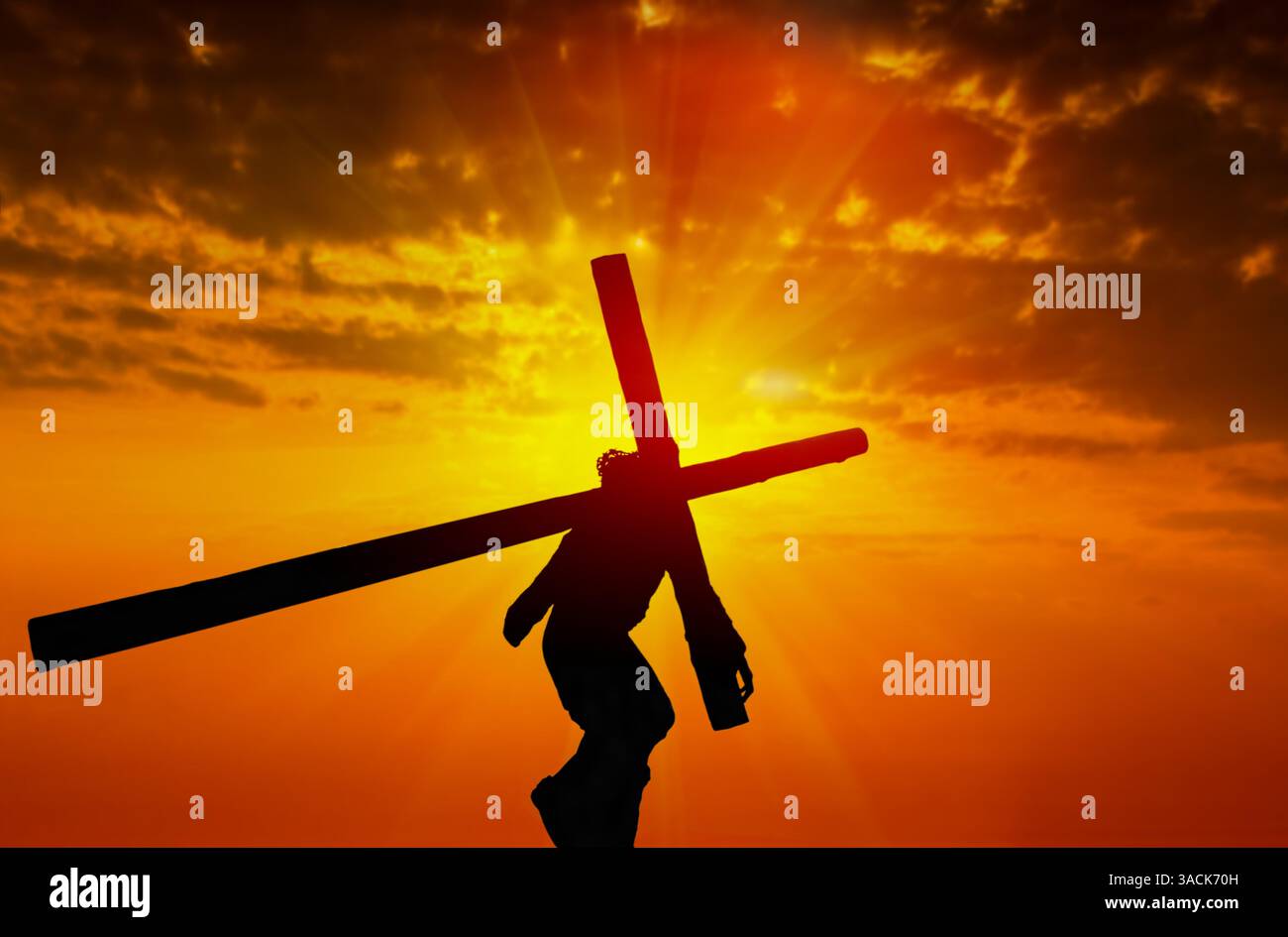 Jesus carrying the cross at sunset christianity concept Stock Photo - Alamy