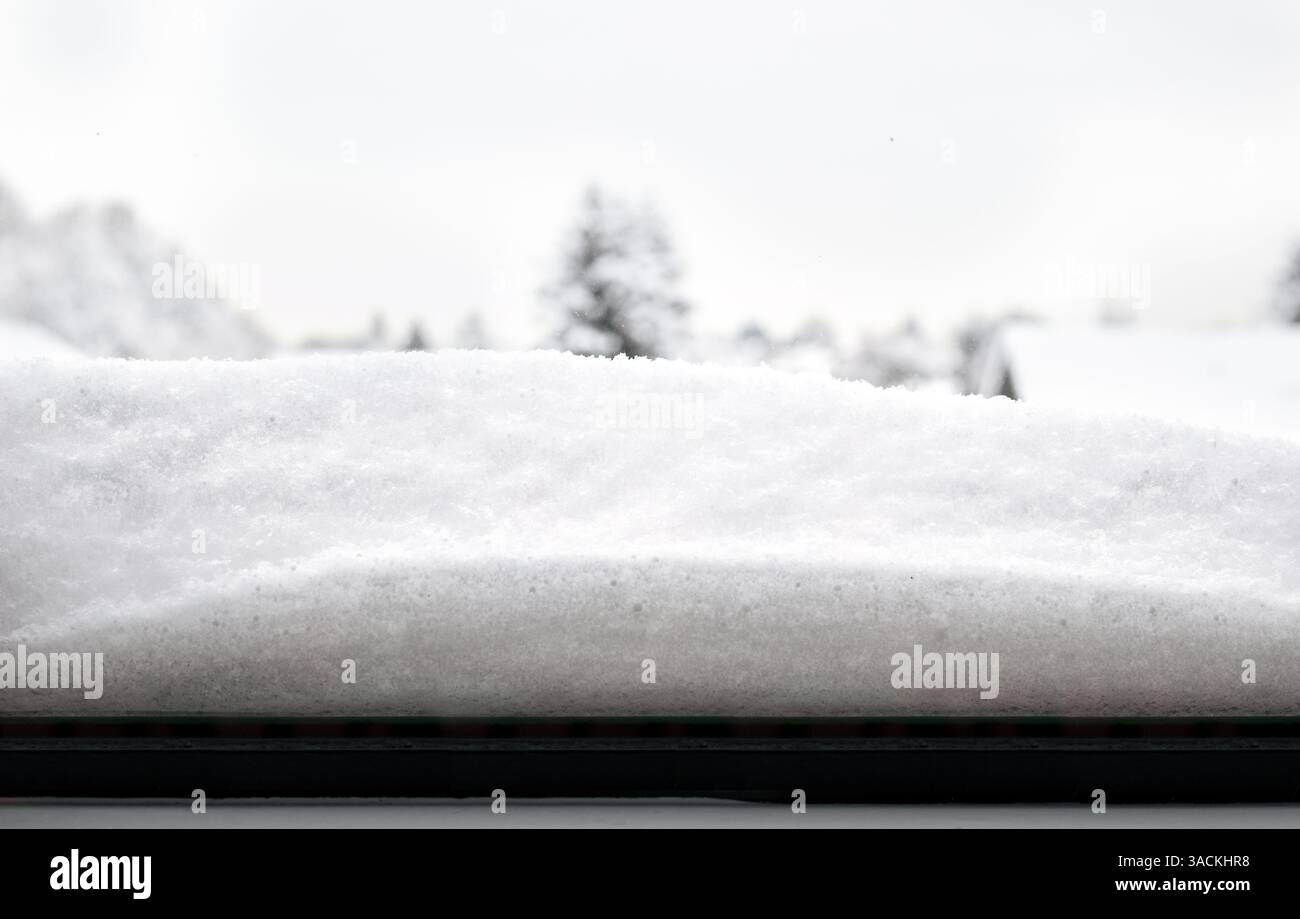 Snow buildup outside of window sill after snow storm or arctic winter ...